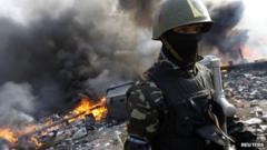 Ukraine crisis: Bridges destroyed outside Donetsk - BBC News