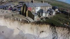 Beachy Head safety alert as walkers spotted above crack - BBC News
