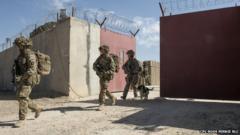 British forces leave their last outpost in Helmand - BBC News