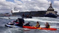 South Pacific climate activists blockade Australia port - BBC News