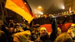 'Anti-Islamisation' group Pegida UK holds Newcastle march - BBC News