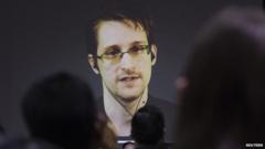 US spy case: Snowden seeks Switzerland asylum move - BBC News