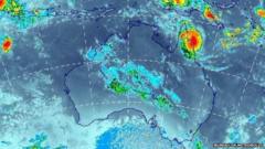 Tropical Cyclone Nathan hits Australia's Queensland coast - BBC News