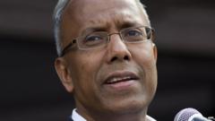 Newspaper headlines: 'Scandal mayor', deficit plans questioned, Top ...