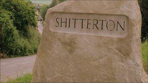 New Shitterton village sign set in stone - BBC News