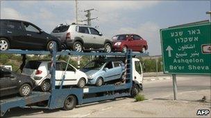 Gaza receives first car shipment from Israel since 2007 - BBC News