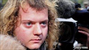 Student fee protester admits throwing fire extinguisher - BBC News