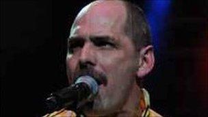 Queen tribute singer Harry Hamilton with Alliance Party - BBC News
