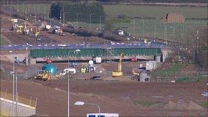 Hundreds work to install new A46 railway bridge - BBC News