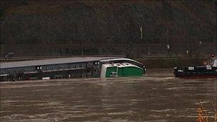 Germany acid tanker capsizes on Rhine: two missing - BBC News