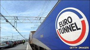 Eurotunnel swings back to profit with record passengers - BBC News