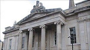 Men appear in court in Londonderry after hammer attack - BBC News