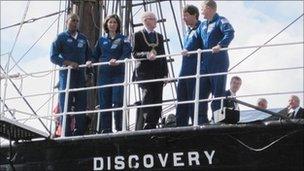 Shuttle crew board Scott's ship RSS Discovery in Dundee - BBC News