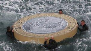Mary Rose £2 coin floated on the Solent - BBC News