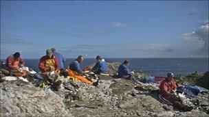 SNP MP Angus MacNeil joins guga hunters on outward trip - BBC News