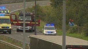 Driver killed when lamppost fell on van on A23 named - BBC News
