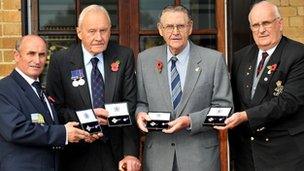 Elizabeth Cross awarded to four Suffolk families - BBC News