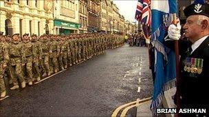 Soldiers of The Highlanders march in Inverness - BBC News