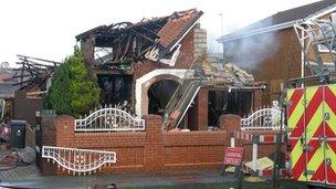 Man arrested after Huyton house fire - BBC News