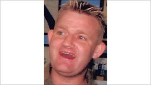 Arrest follows death in Airdrie stairwell - BBC News