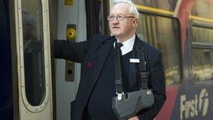 'Big man' video: Train incident conductor back at work - BBC News