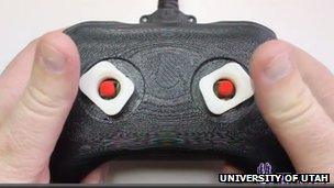 Thumb-stretching controller pitched to console makers - BBC News