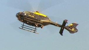 Youths 'shone laser' at police helicopter - BBC News