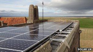 Solar panels are installed at Lindisfarne Castle - BBC News