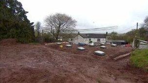 Exbourne community shop moves underground - BBC News