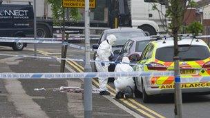 Photo-fits released after Luton shooting - BBC News
