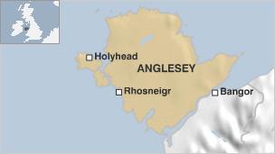Anglesey beach rescue: Man dies and another critically ill - BBC News
