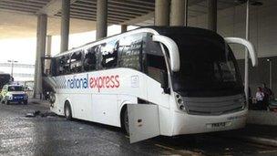 Coach catches fire at Gatwick Airport - BBC News