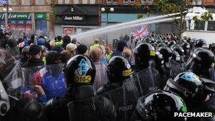 Belfast riots: Police urge calm ahead of Castlederg march - BBC News