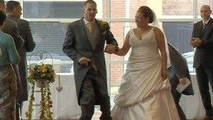 Paralympian Stephen Miller walks down aisle at wedding - BBC News
