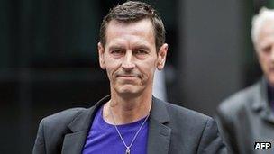 Campaigner Tim Haries guilty of defacing Queen portrait - BBC News