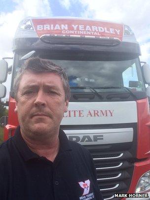 'Desperate migrants' waiting to pounce on Calais truckers - BBC News