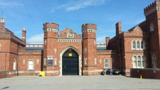 Cars set alight at Lincoln prison in suspected arson attacks - BBC News