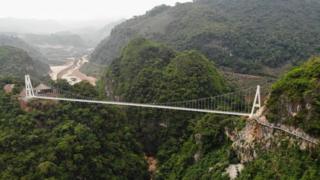 World's largest see-through bridge opens in Vietnam - BBC Newsround