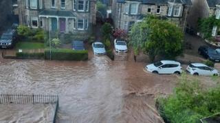Torrential rain and thunderstorms bring flooding and disruption - BBC News
