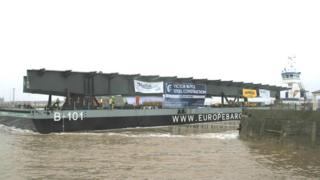 First piece of Lowestoft's Gull Wing Bridge being moved into place ...
