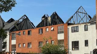 Basingstoke flat complex blaze began by accident - fire service - BBC News