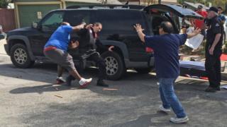 California Ku Klux Klan rally ends with stabbings and arrests - BBC News