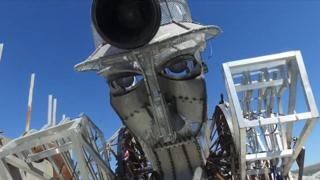 Giant miner puppet walks through Cornwall - BBC News