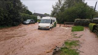 Flash flooding causes disruption across East of England - BBC News