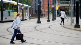 Coronavirus: Train stations put crowd-control measures in place - BBC News
