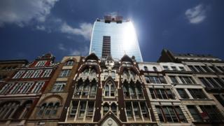 Climate change: 'Cooling paint' could cut emissions from buildings ...