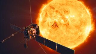 Nasa captures pic of the Sun 'smiling' with a happy face - BBC Newsround
