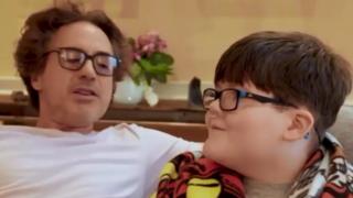 Family of the boy who charmed Iron Man say he is their superhero - BBC News