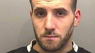 Cardiff murder probe: Police issue picture of wanted man - BBC News