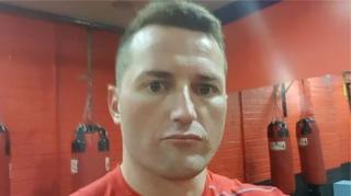 Robbie Lawlor murder: Police seek to identify hooded man - BBC News